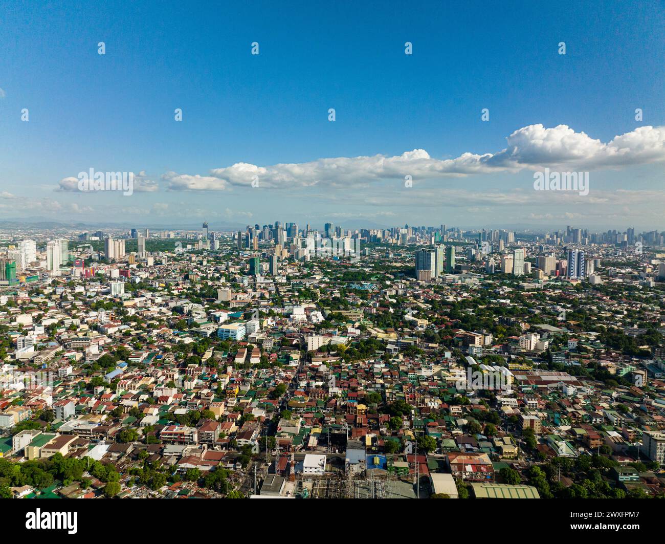 Manila is the capital of the Philippines with modern buildings and ...