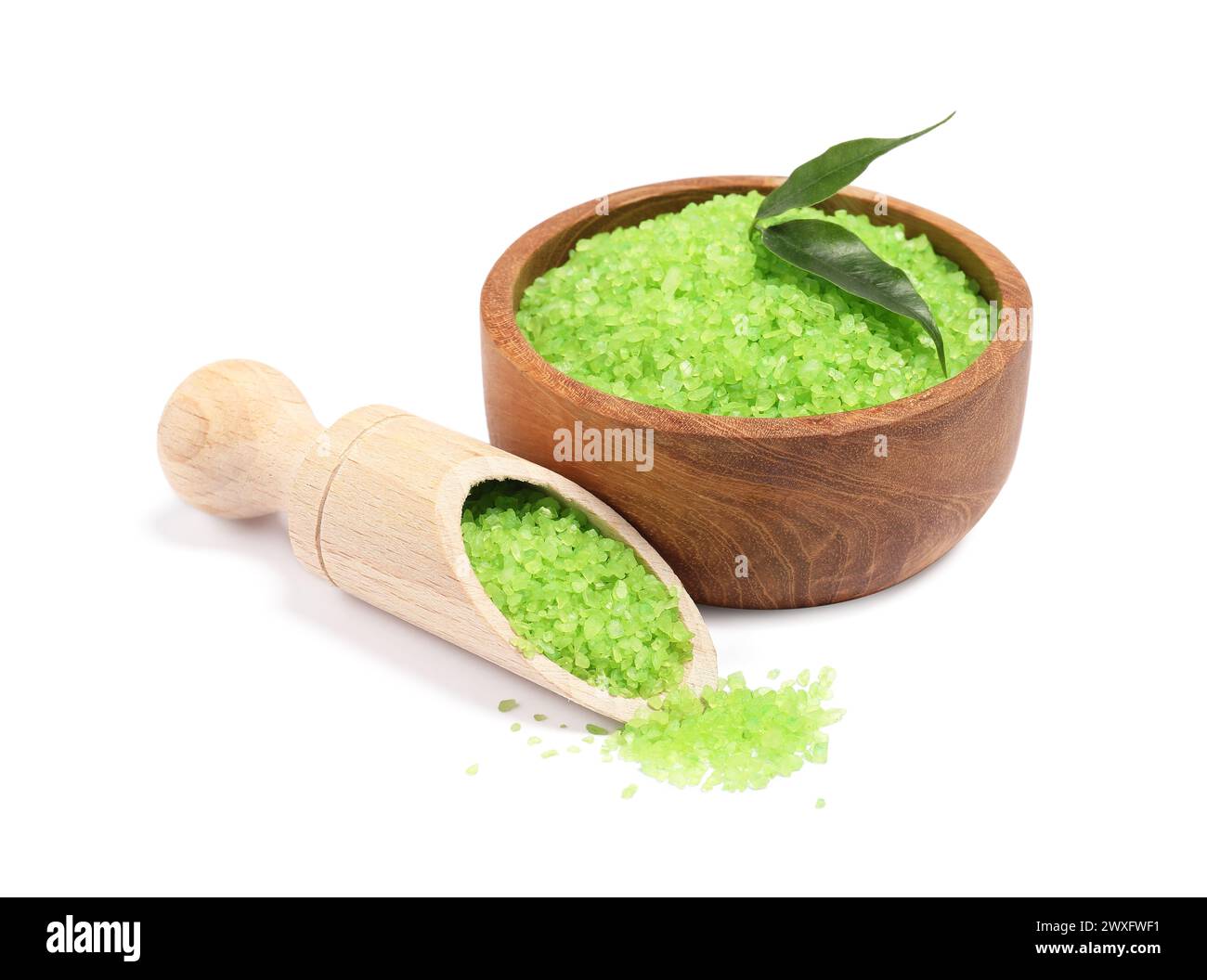 Green sea salt in bowl, scoop and leaves isolated on white Stock Photo ...