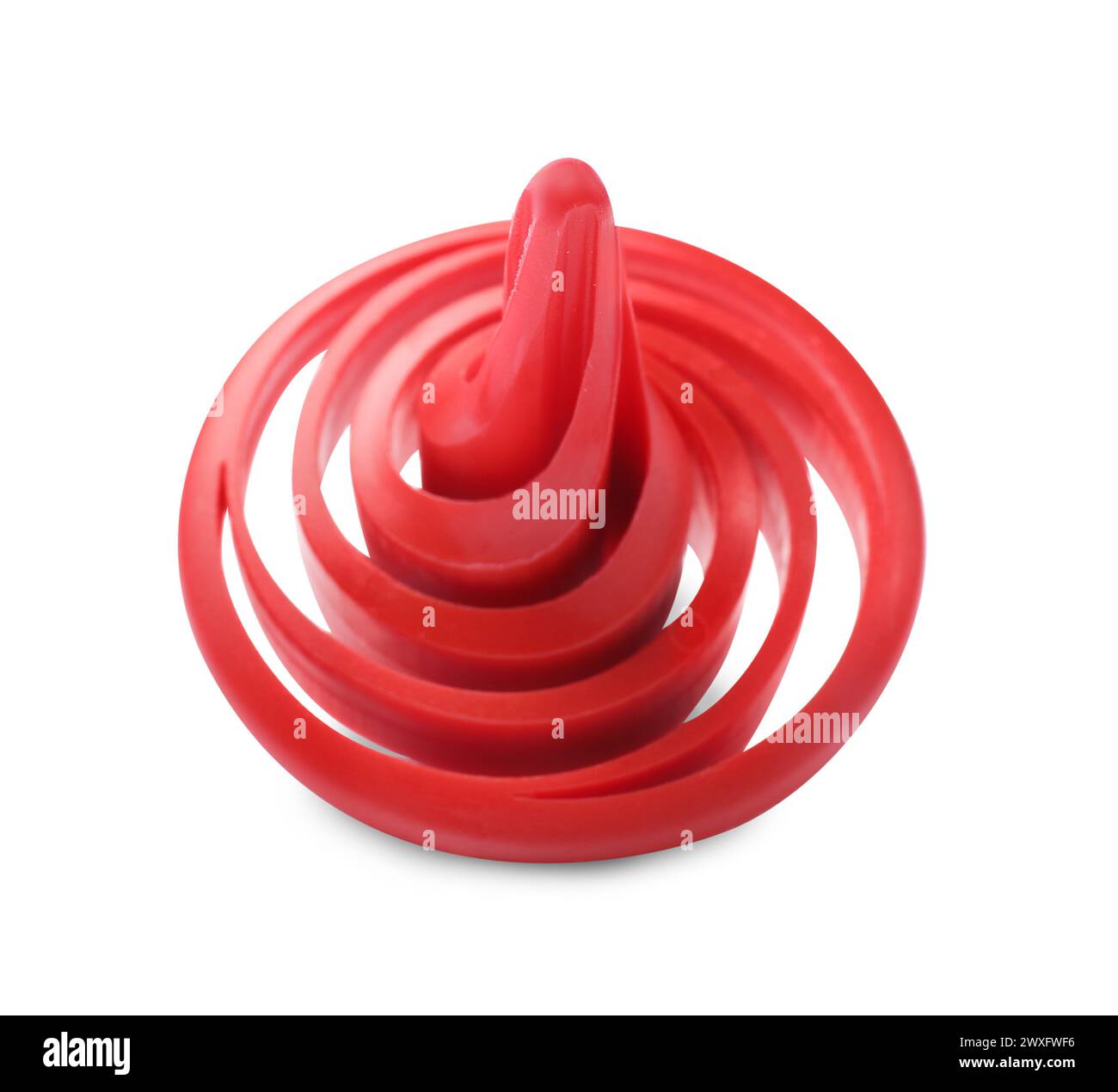 One red spinning top on white background Stock Photo - Alamy