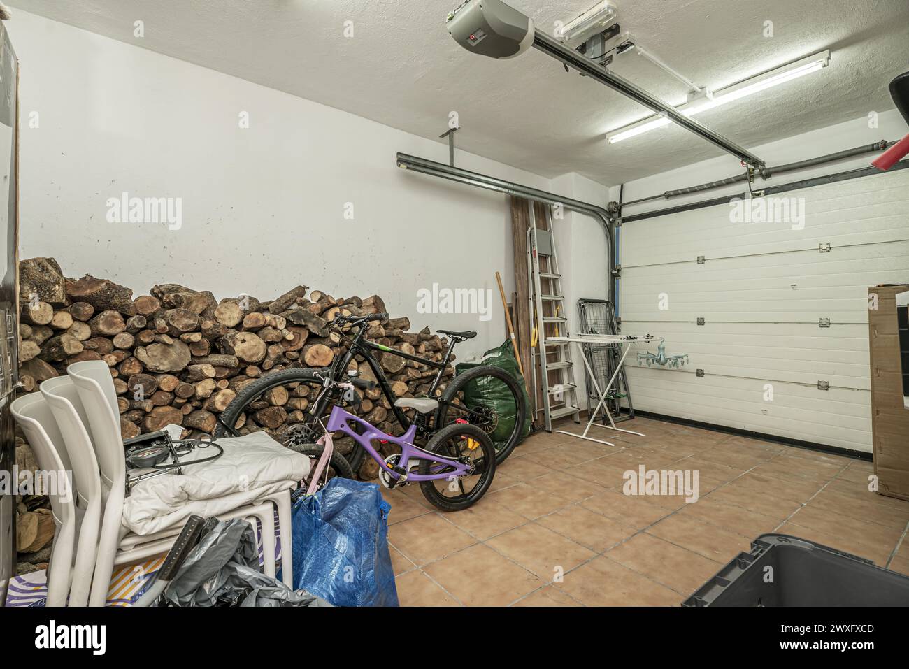 Interior of a detached garage used as a storage room and woodshed Stock ...