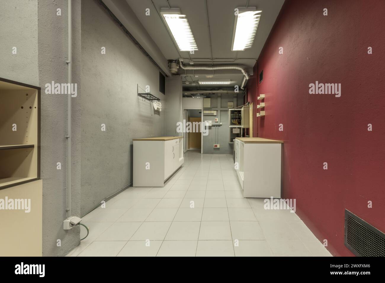 A room dedicated to an office with some electronic equipment and walls ...