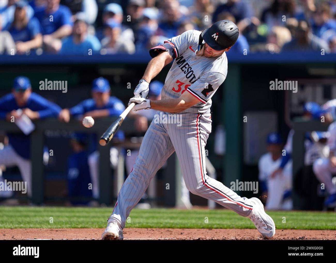 MAR 30, 2024: Minnesota Twins right fielder Matt Wallner (38) drives a fly ball at Kauffman ...