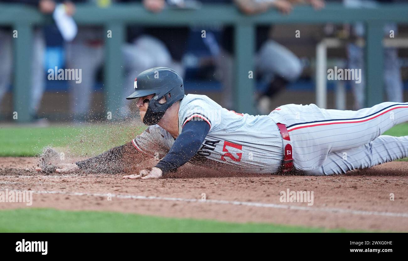 MAR 30, 2024: Minnesota Twins catcher Ryan Jeffers (27) slides to score ...