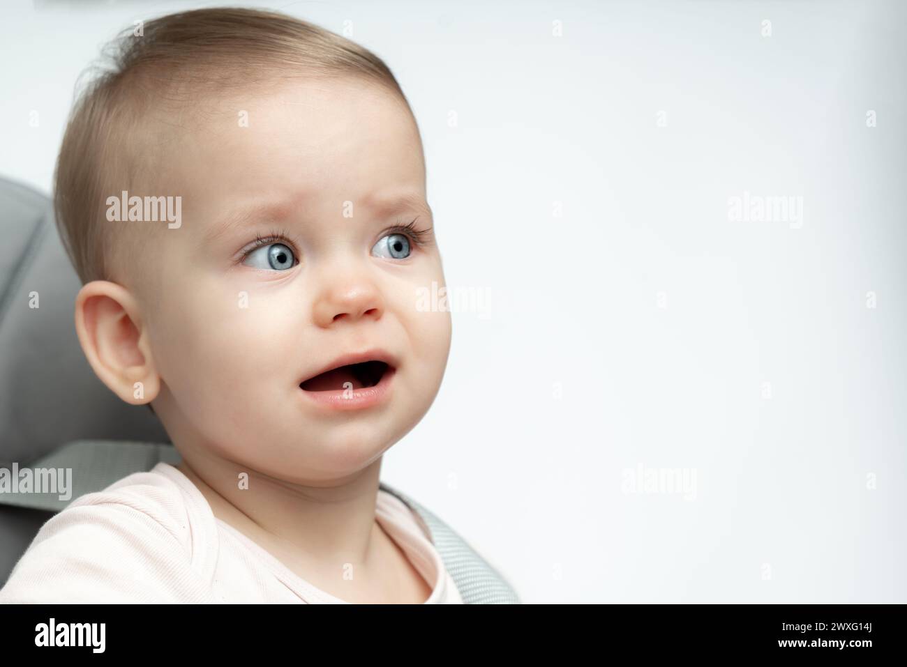 Toddler crying in chair hi-res stock photography and images - Alamy