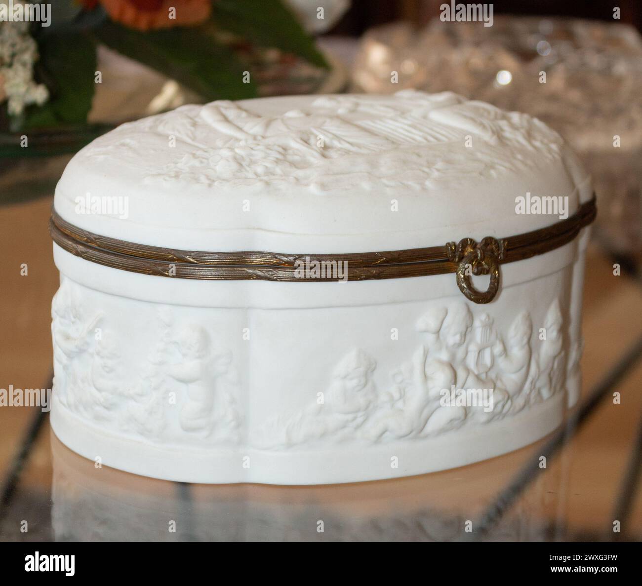 White ceramic chest box with angels embroided and brown wooden edges on ...
