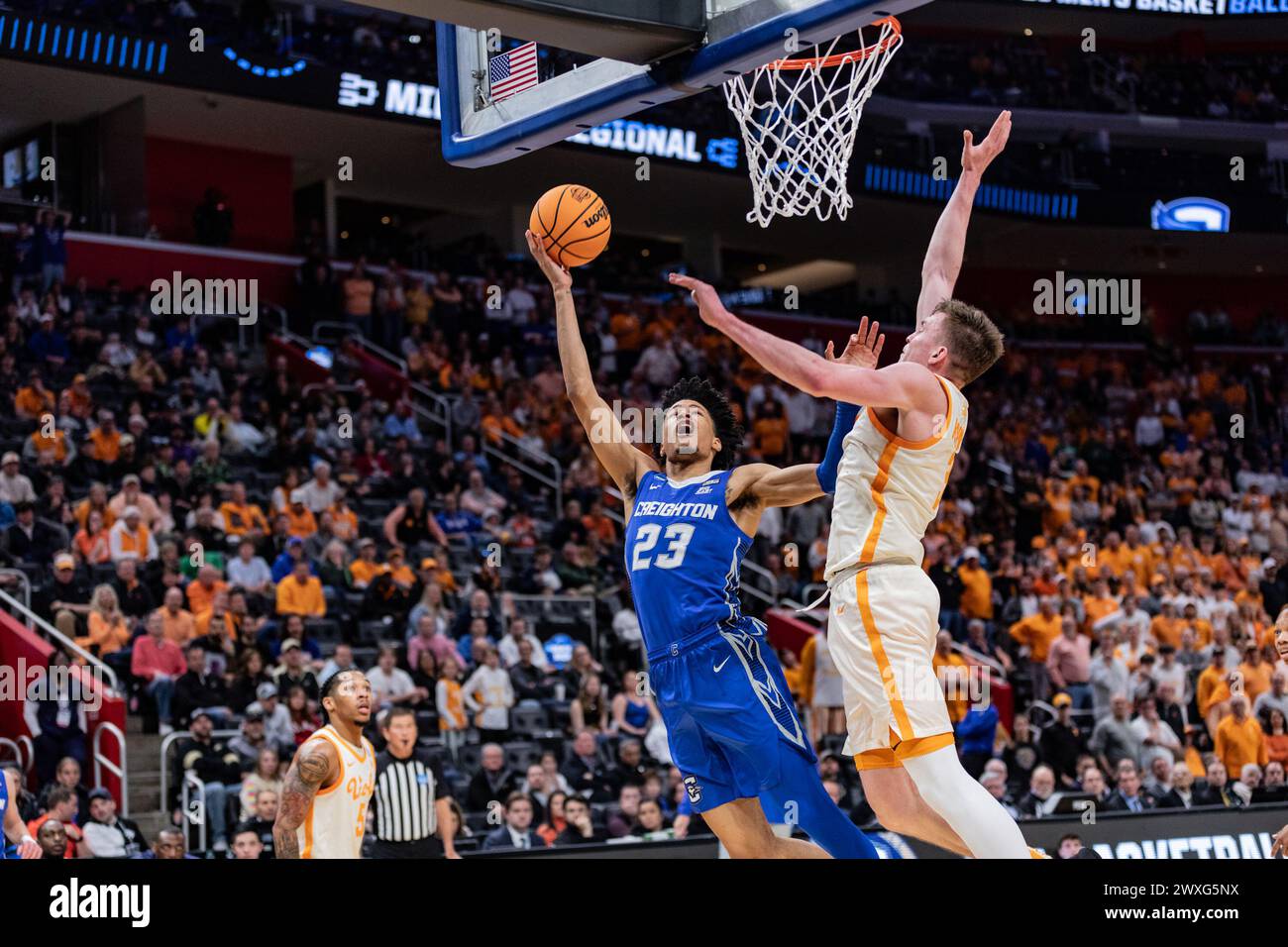 Detroit, United States. 29th Mar, 2024. Trey Alexander (L) of Creighton ...