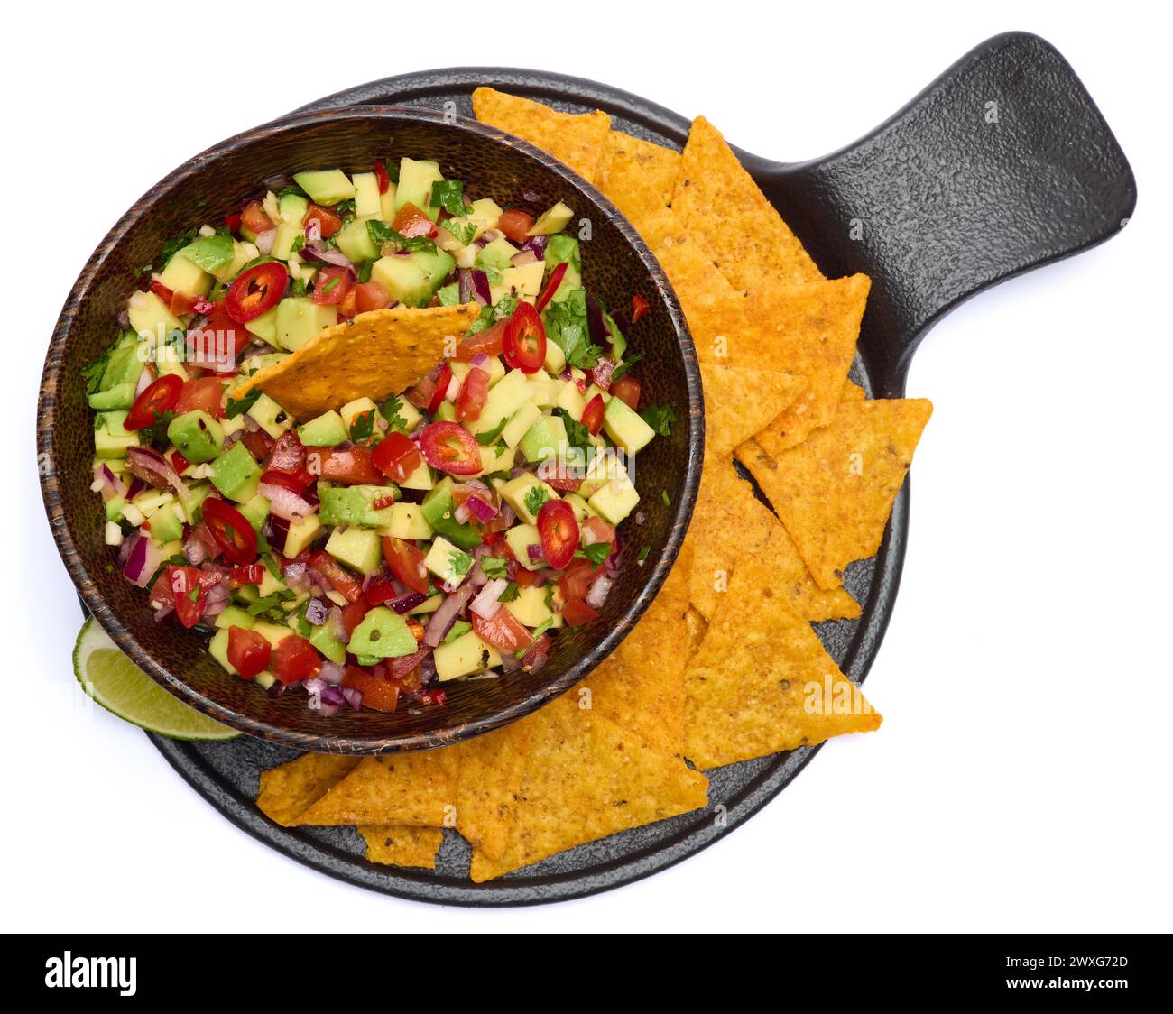 traditional salsa dip snack in wooden bowl and corn nacho chips ...