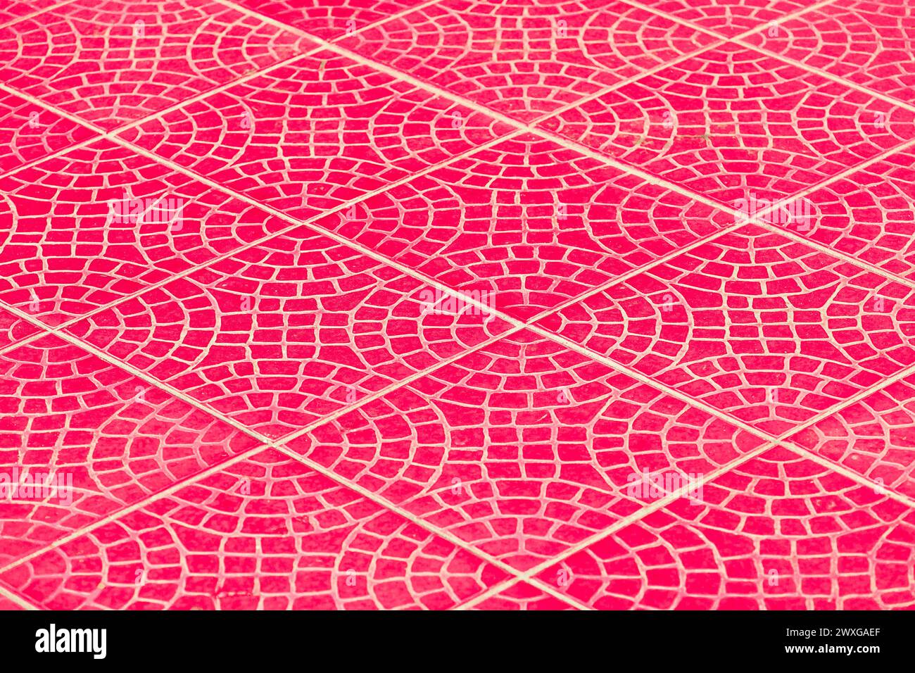 Red pink paving slabs floor abstract pattern city street surface stone ...