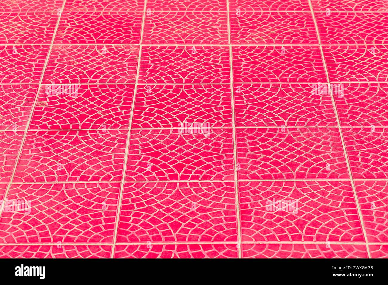 Red pink paving slabs floor abstract pattern city street surface stone ...