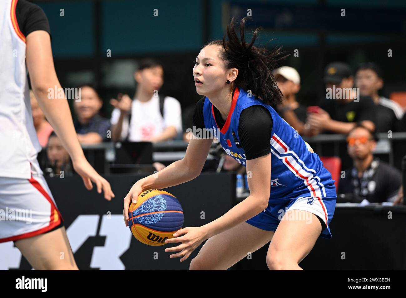 Singapore. 31st Mar, 2024. Khulan Onolbaatar of Mongolia dribbles the ...