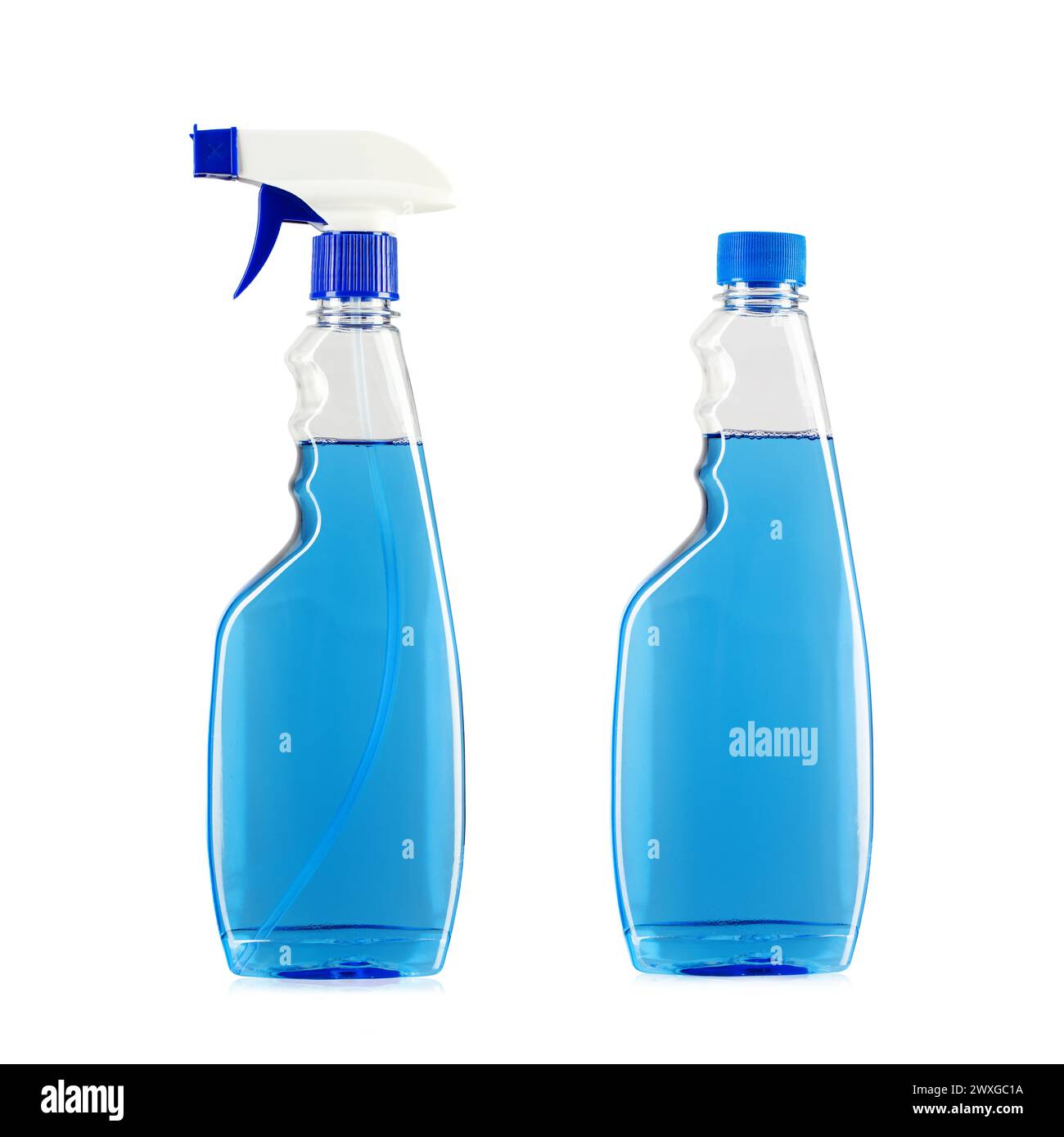 Two bottles of blue detergent. Isolated on white background. File ...