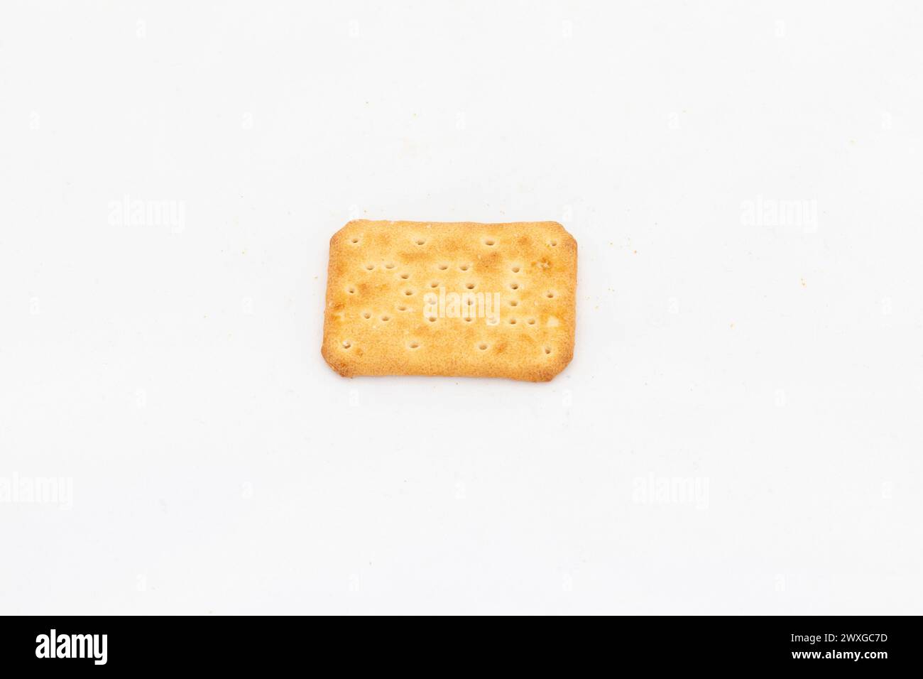 A single piece of salty cracker in rectangular shape on white isolated ...