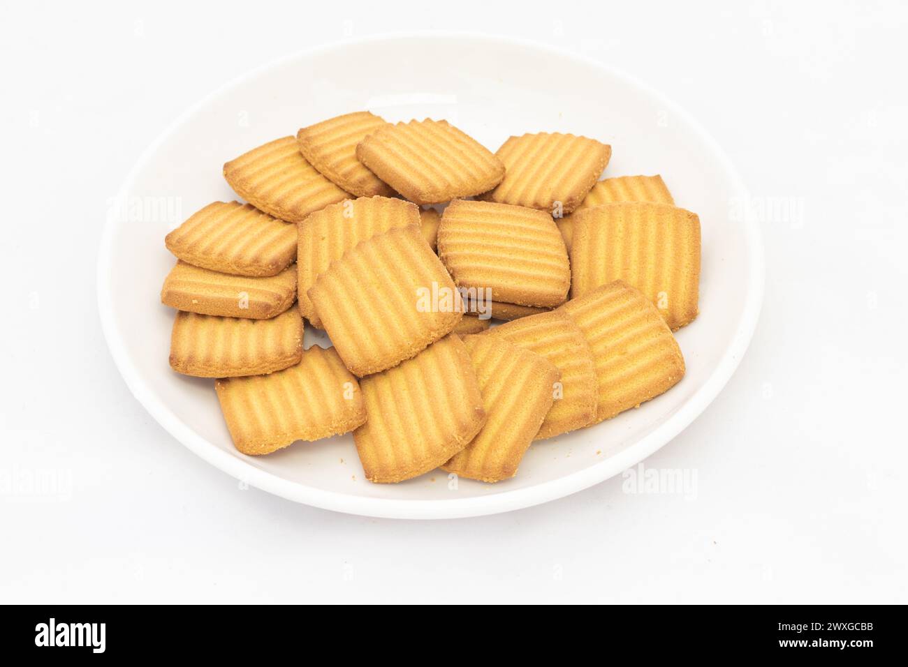 Pakistan favorite biscuits in a plate on white background with copy ...