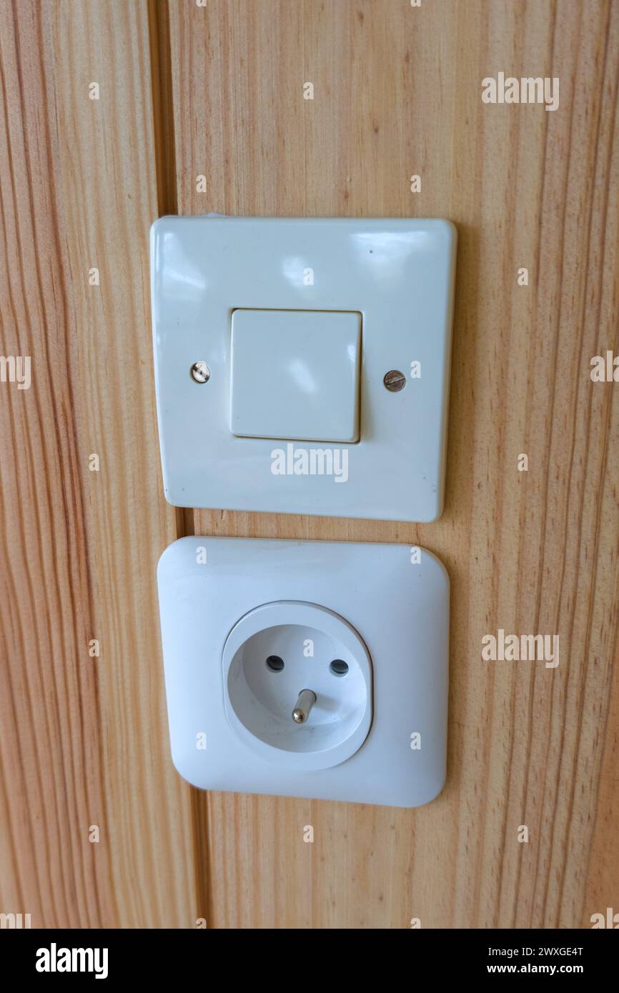 electric socket white for plug cord electrical outlet and a switch on ...