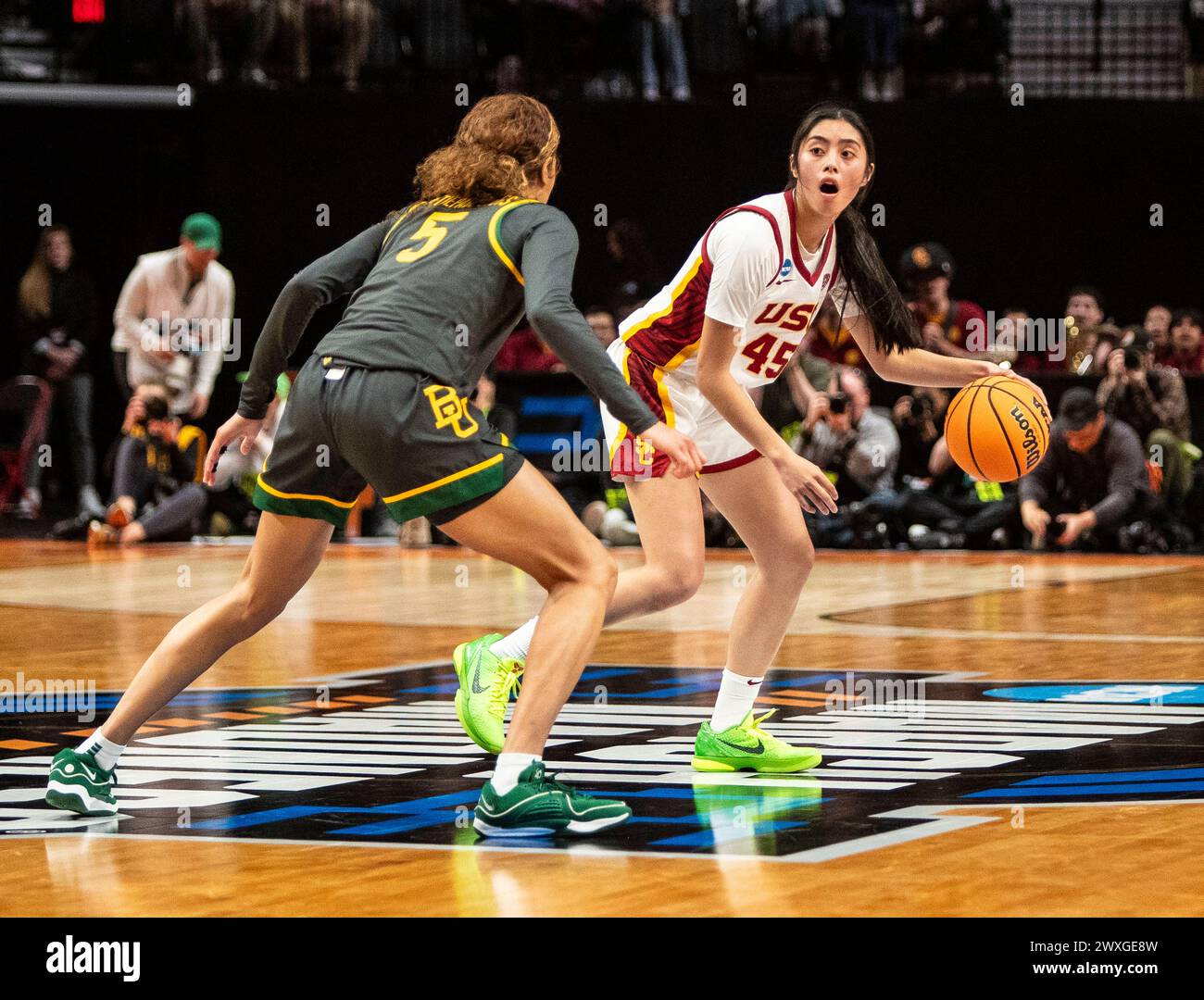 Portland, OR U.S. 30th Mar, 2024. A. USC guard Kayla Padilla (45)brings ...