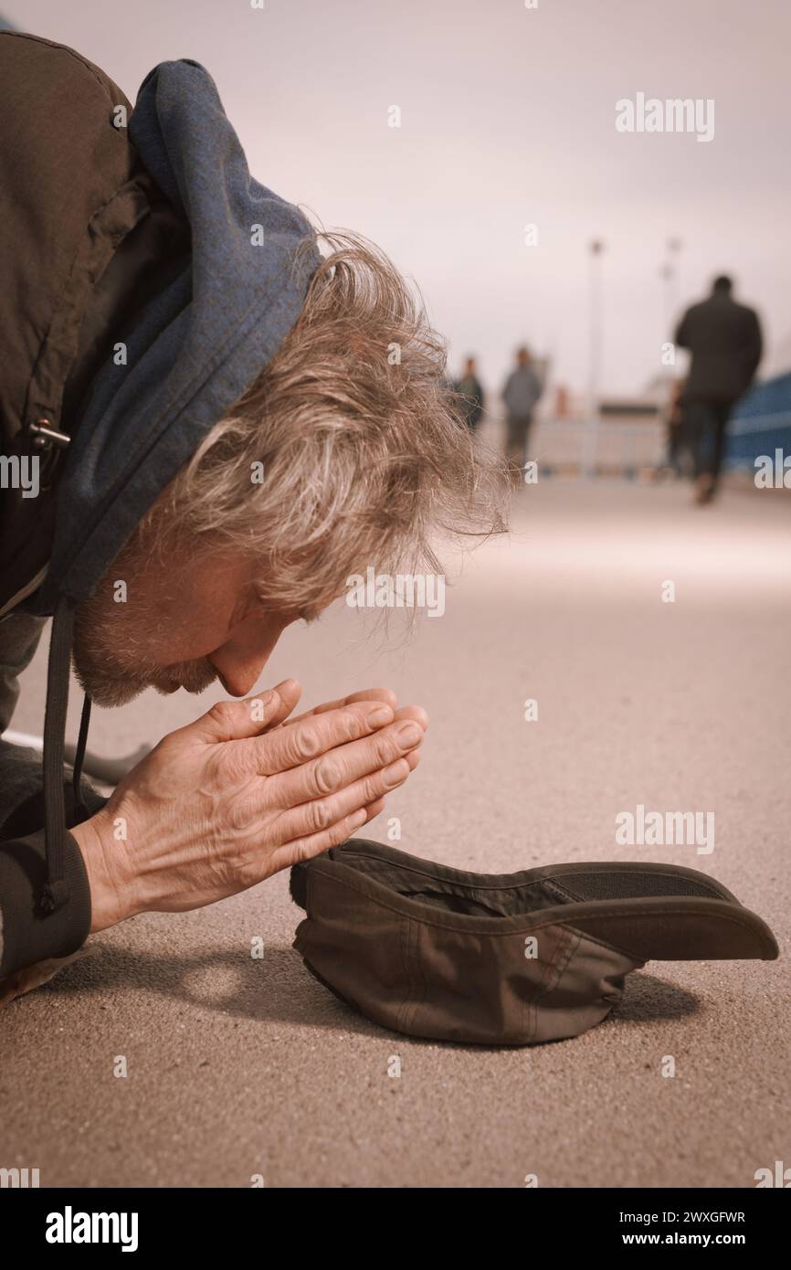 Senior citizen beggar on city overpass begging for some money Stock ...