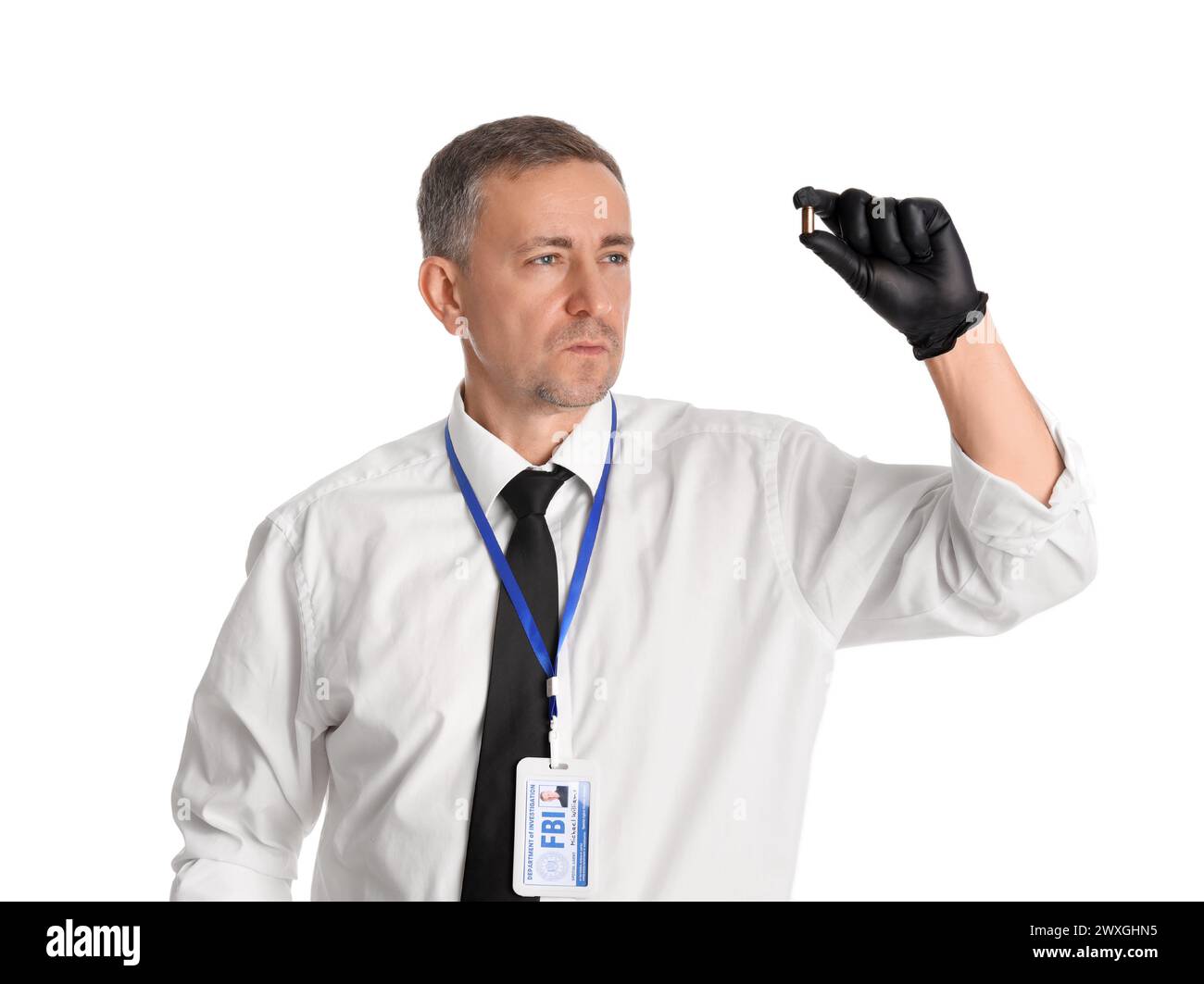 Mature FBI agent with bullet on white background Stock Photo - Alamy