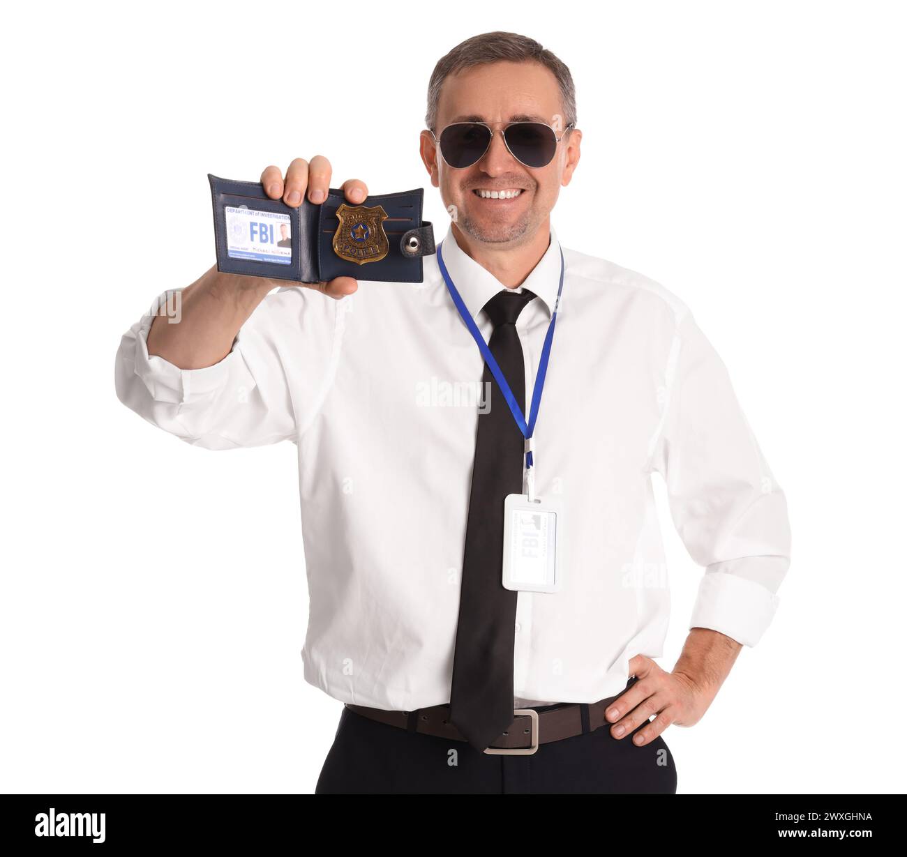 Mature FBI agent showing document on white background Stock Photo - Alamy
