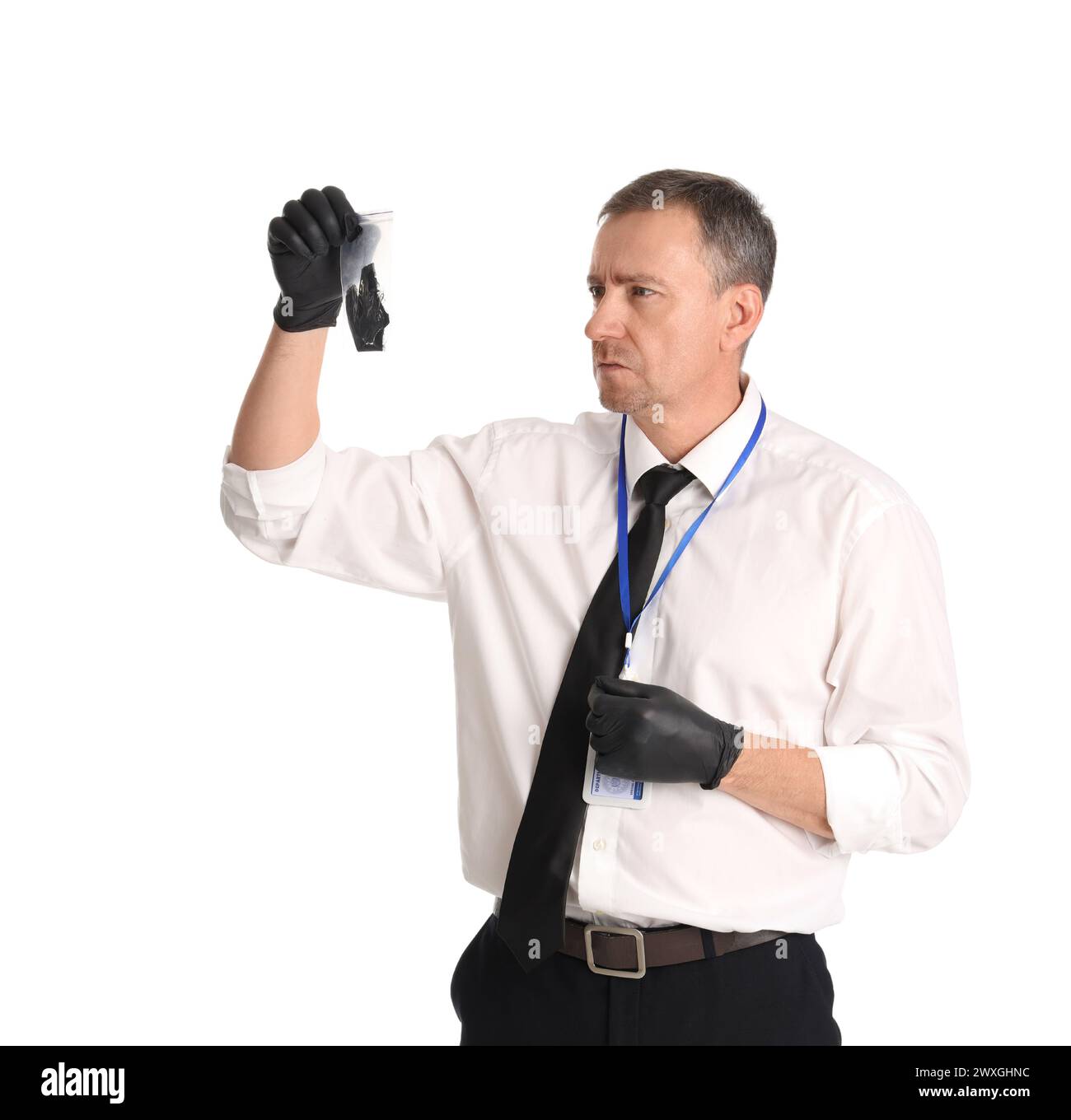 Mature FBI agent with evidence on white background Stock Photo - Alamy