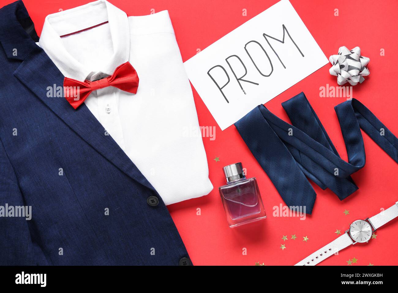 Male suit with tie, wrist watch and text PROM on red background Stock ...