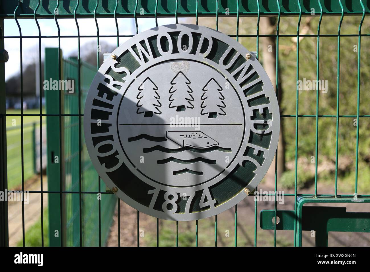 Wibbandune, Club crest on gate Colliers Wood FC football ground, Robin ...