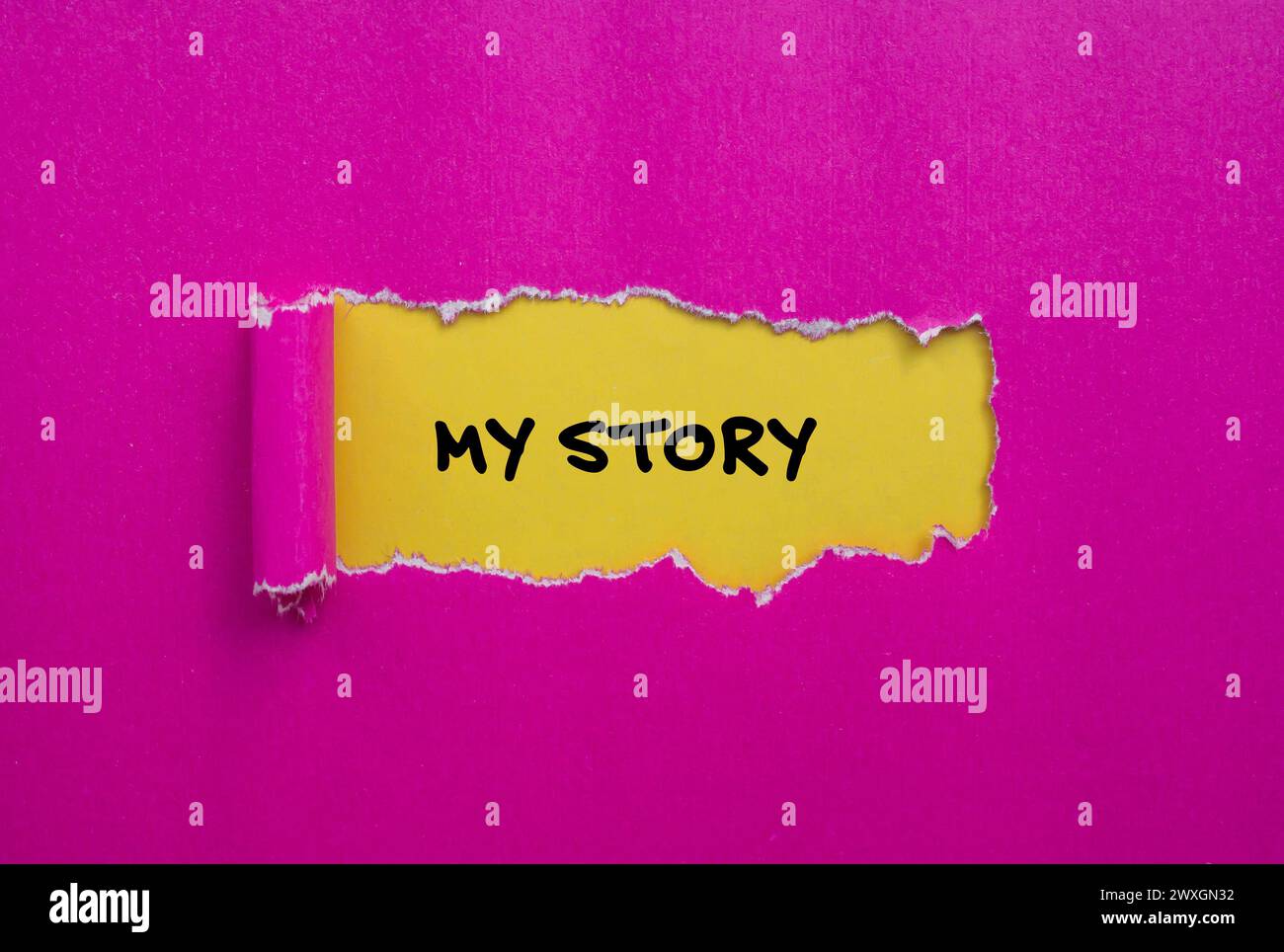 My story words written on pink torn paper with yellow background ...