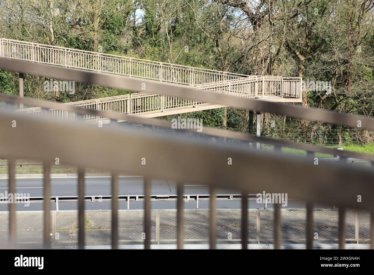 Pedestrian footbridge over A3 metal and concrete structure with ...