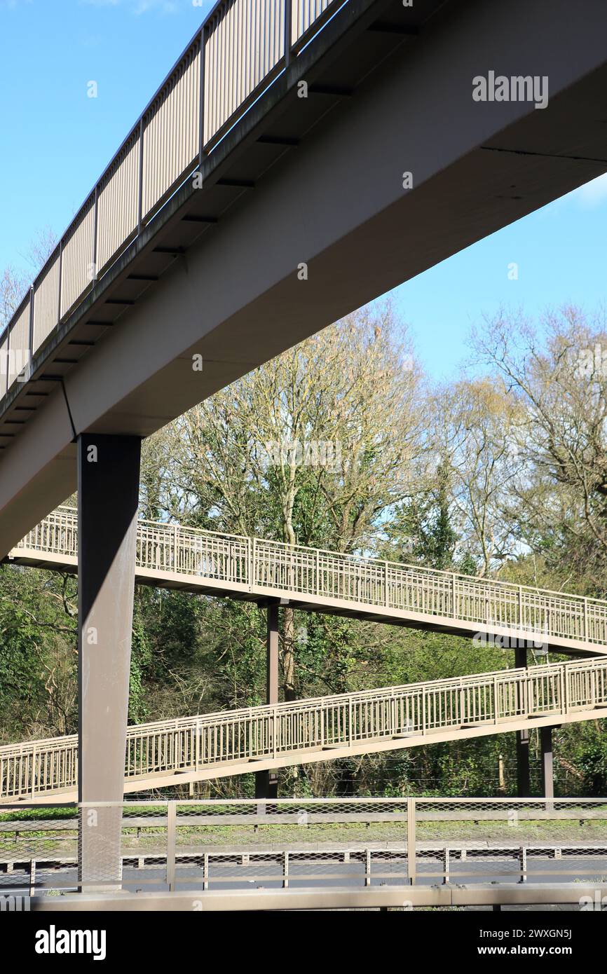 Pedestrian footbridge over A3 metal and concrete structure with ...