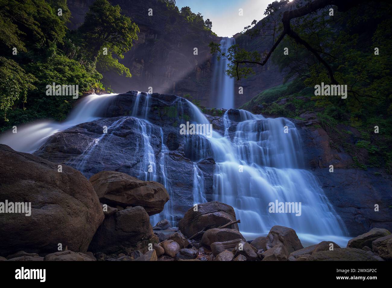 A scenic view of waterfalls of Ciletuh Geopark in Sukabumi, West Java ...