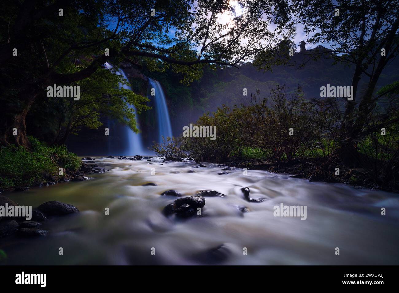 A scenic view of waterfalls of Ciletuh Geopark in Sukabumi, West Java ...