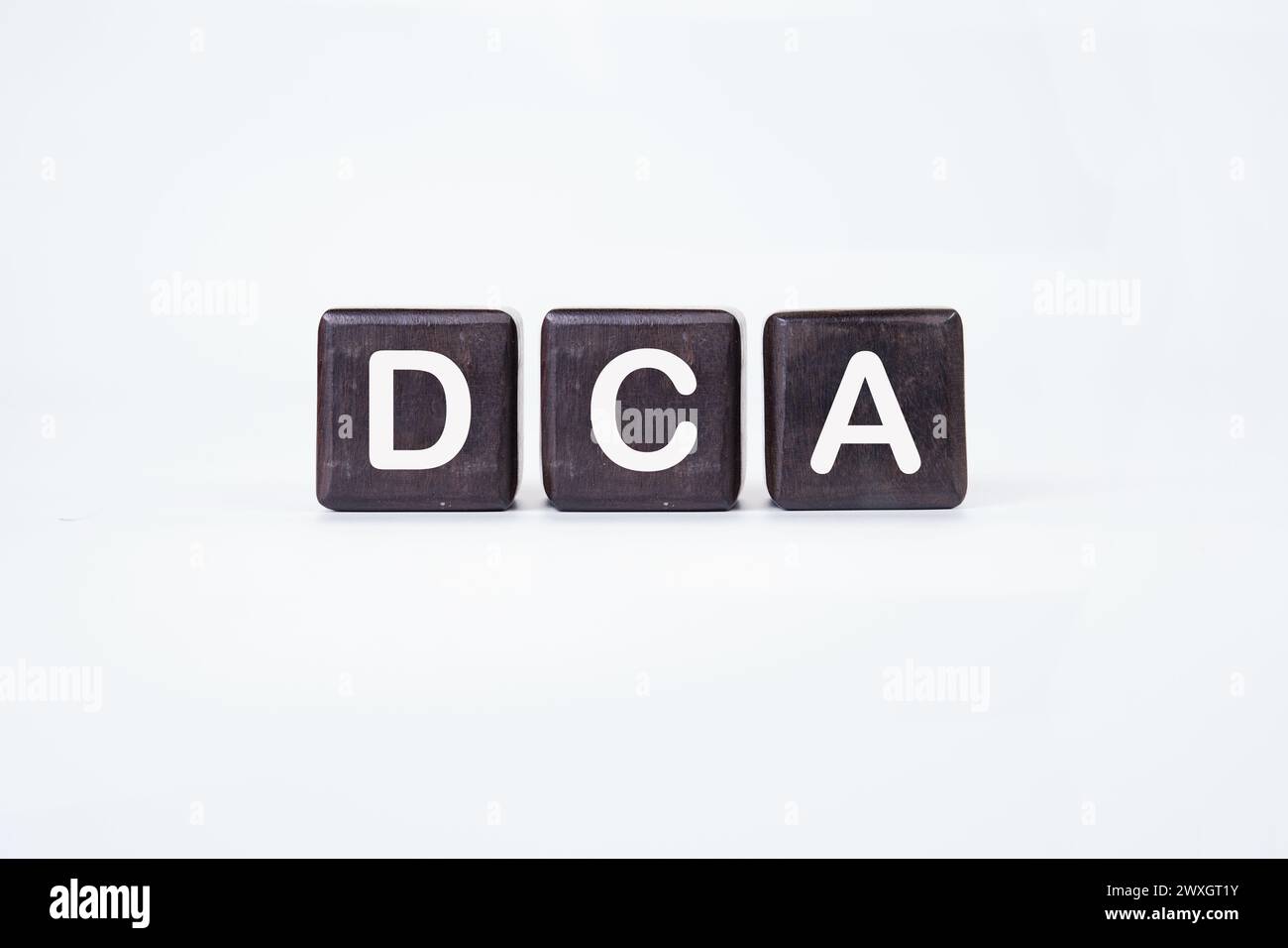Dollar cost averaging DCA text on cubes on a white background Stock Photo - Alamy