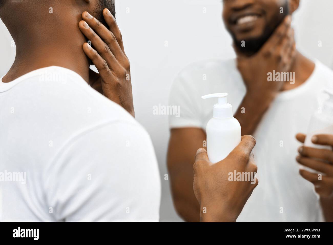Man lotion black and white hi-res stock photography and images - Alamy