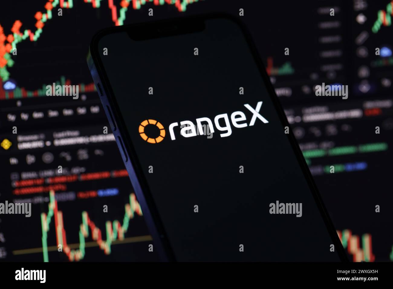 KYIV, UKRAINE - MARCH 15, 2024 OrangeX logo on iPhone display screen ...