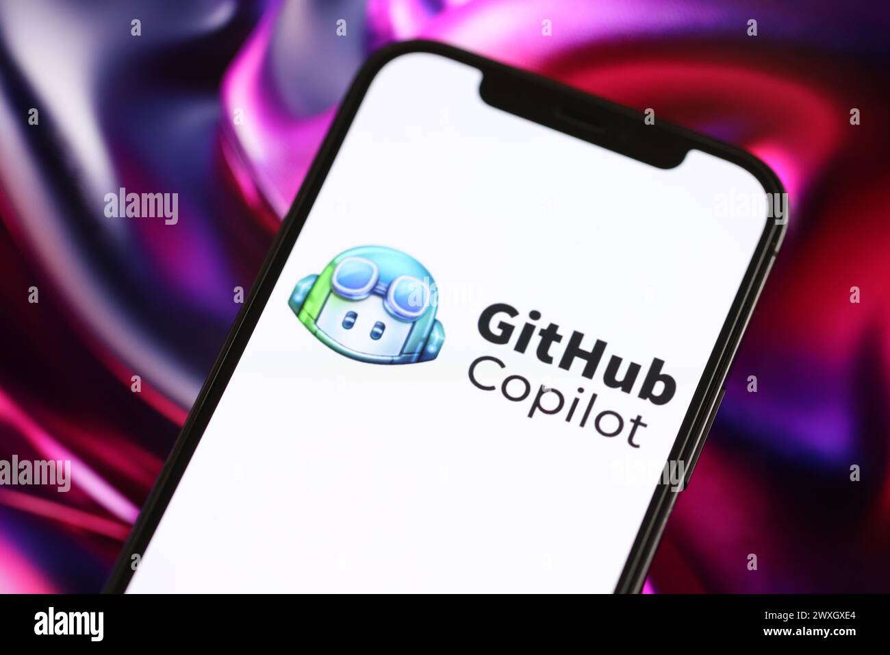 KYIV, UKRAINE - MARCH 17, 2024 Github copilot logo on iPhone display ...