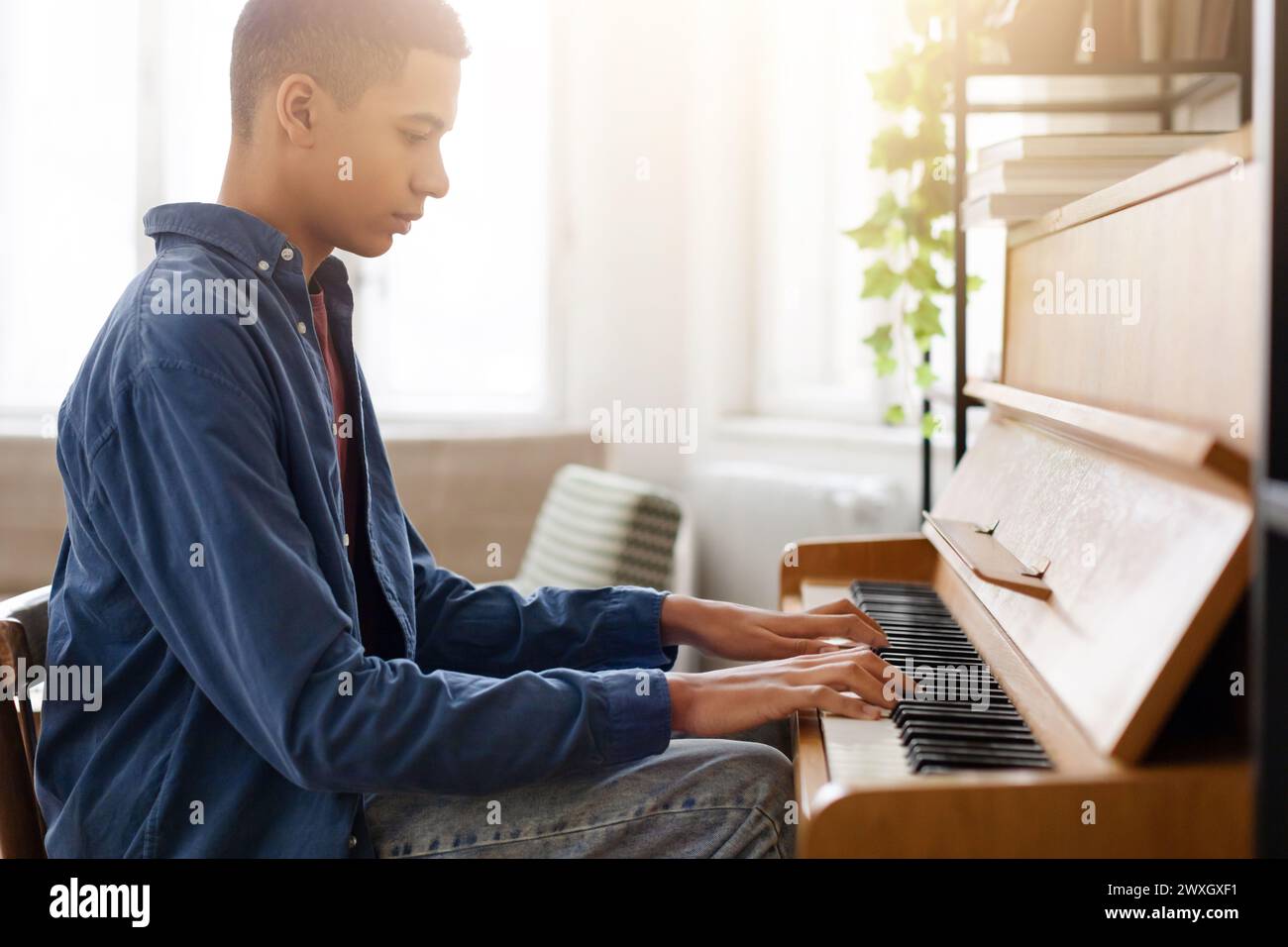 Hands playing upright piano hi-res stock photography and images - Alamy