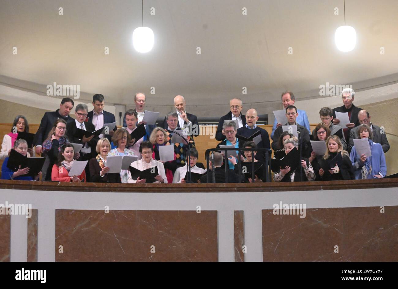 Munich, Germany. 31st Mar, 2024. A church choir sings at a Protestant ...
