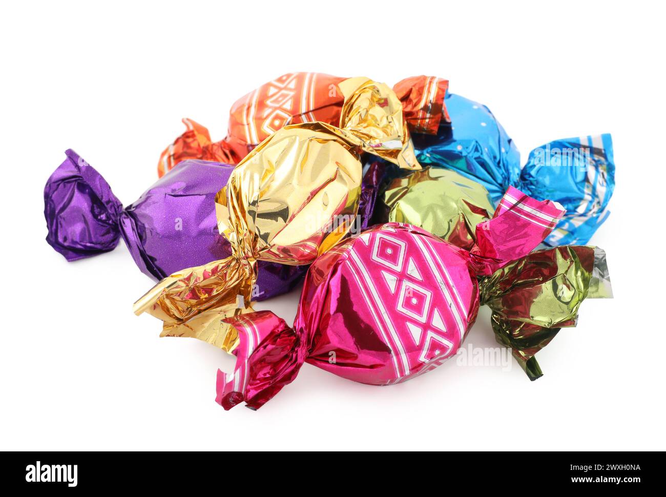 Pile of sweet candies in colorful wrappers on white background Stock ...