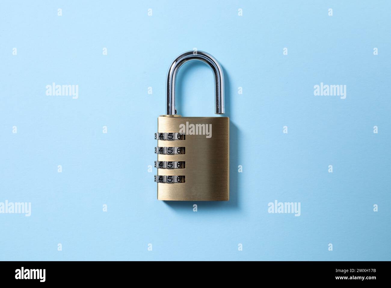 Steel combination padlock on light blue background, top view Stock ...