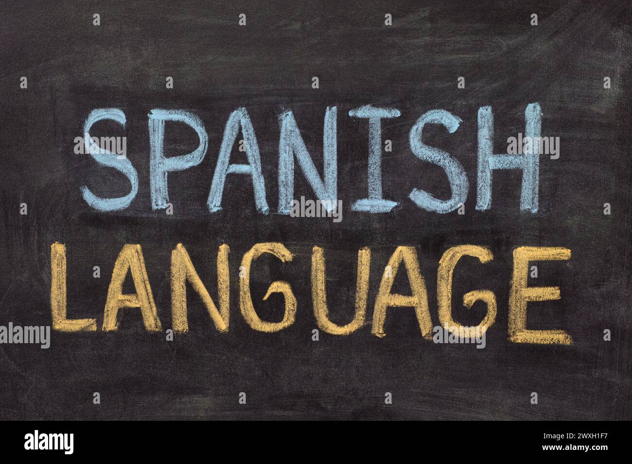 The words Spanish Language written in chalk on a blackboard Stock Photo ...