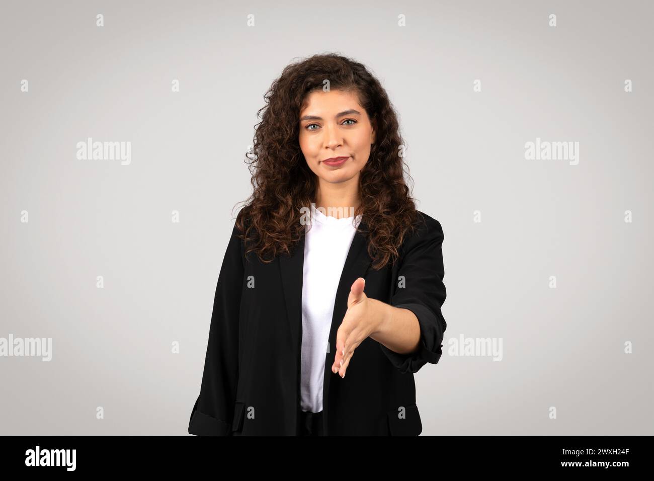 Business woman hand extended handshake hi-res stock photography and ...