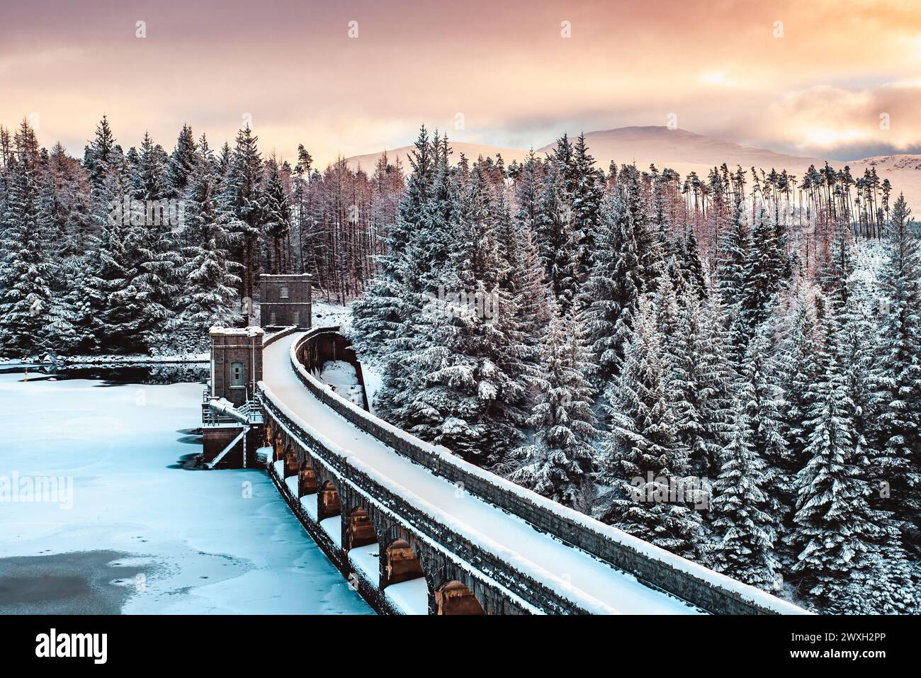 The Laggan Dam (Roybridge Reservoir) and spillway frozen over and ...