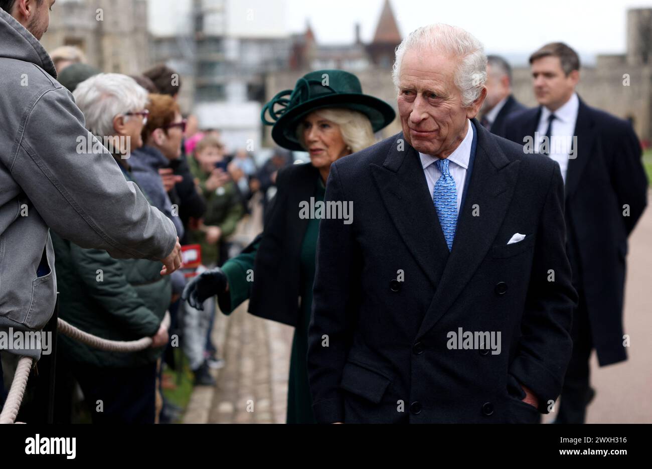 King Charles III and Queen Camilla meet members of the public following ...