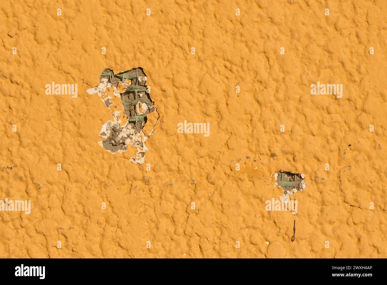 Hole wall close-up ruined broken damaged construction texture bright ...