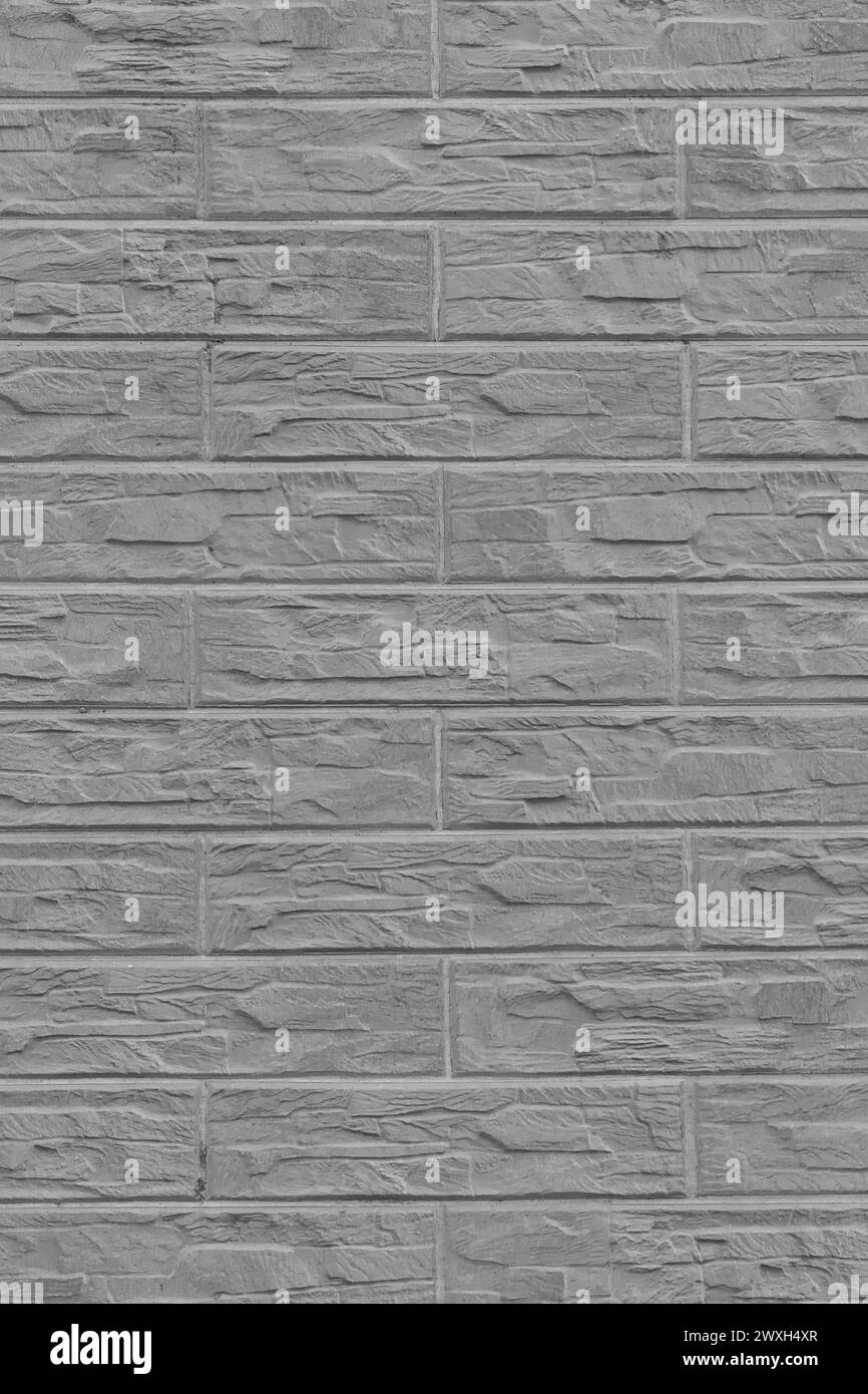 Grey abstract brick wall pattern texture facade house background Stock ...