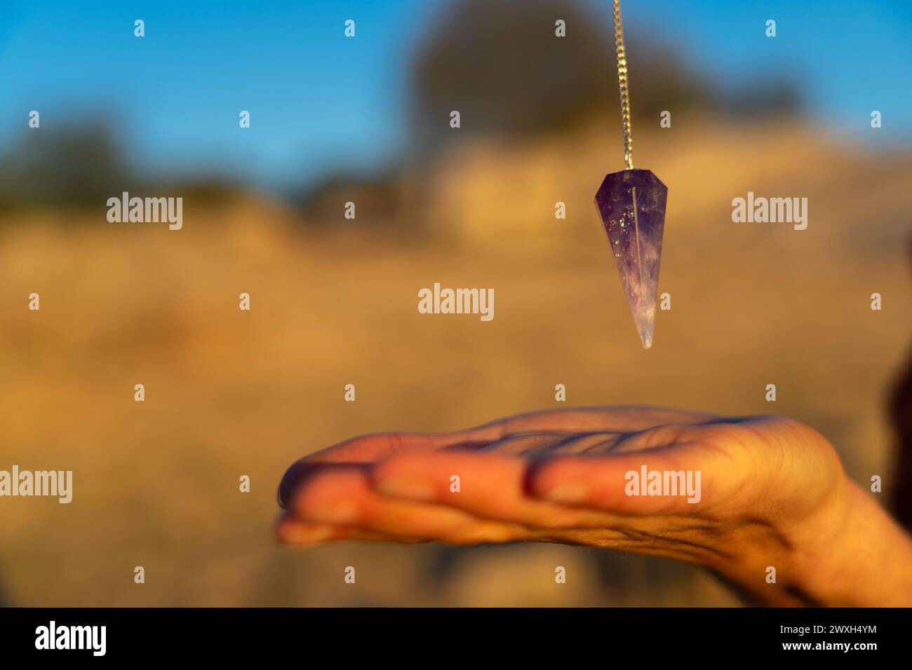 Pendulum dowsing hi-res stock photography and images - Alamy