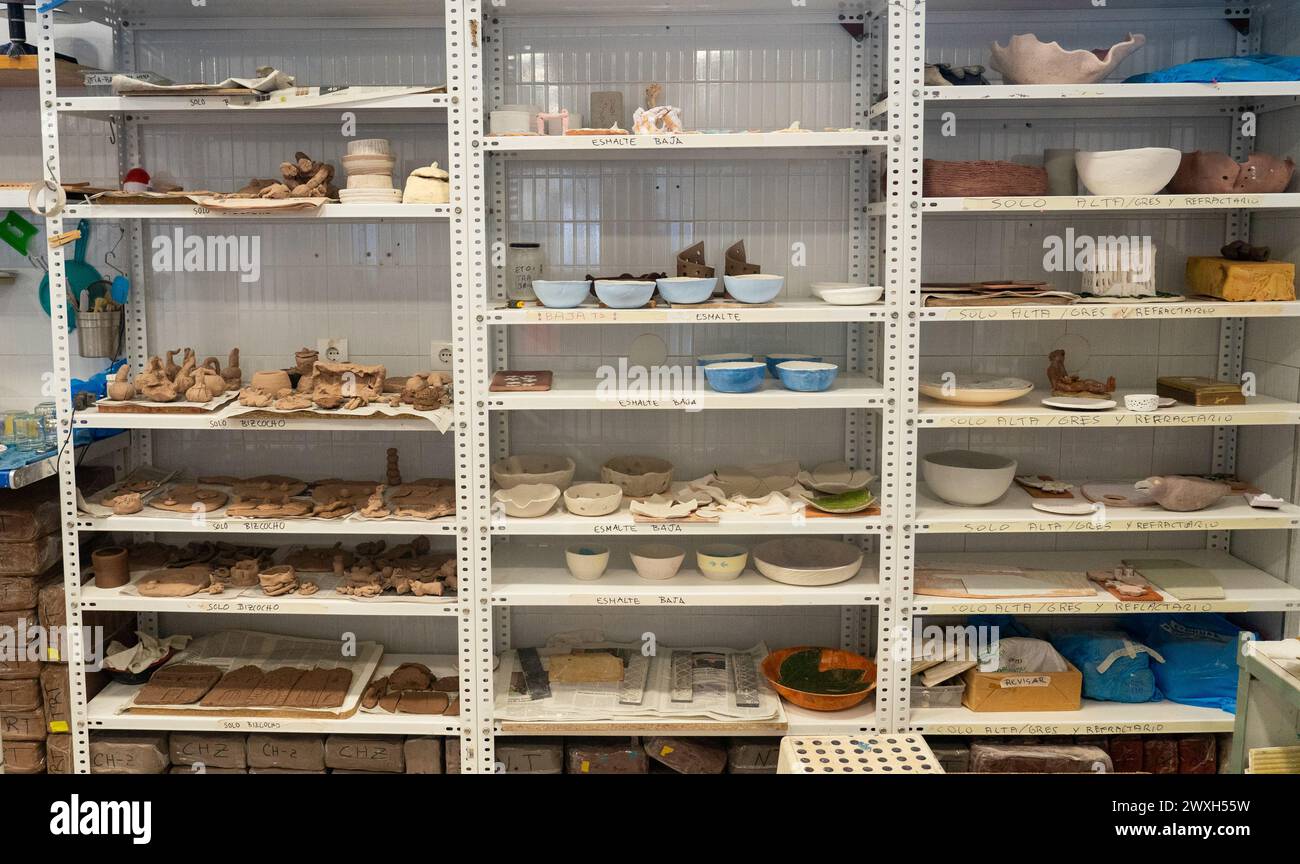 Shelf of a pottery workshop with ceramic pieces Stock Photo - Alamy
