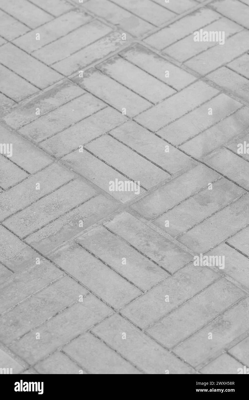 Gray stone paving slabs mosaic square floor street city road surface ...