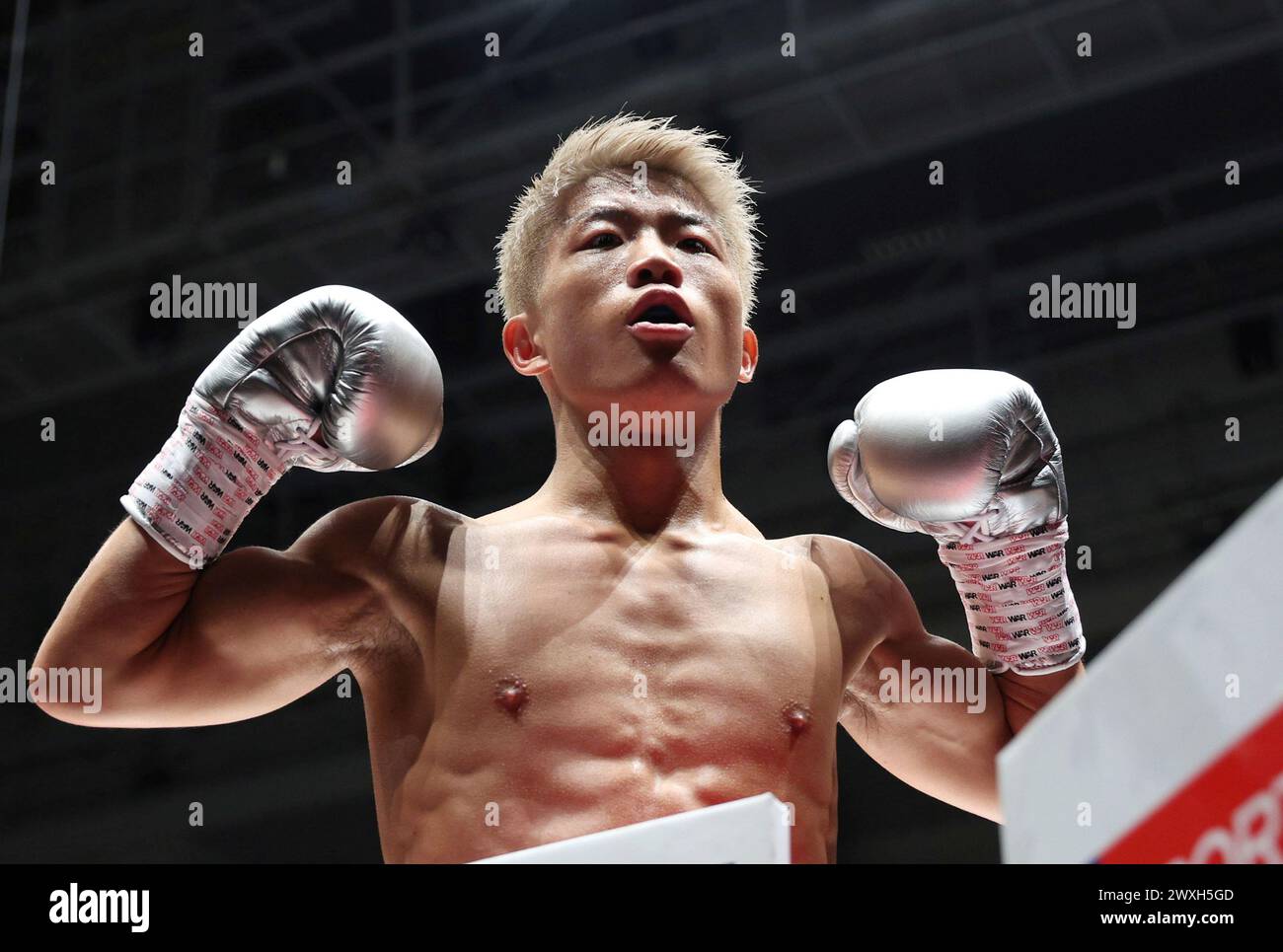 Japanese IBF minimumweight world champion Ginjiro Shigeoka shows a ...