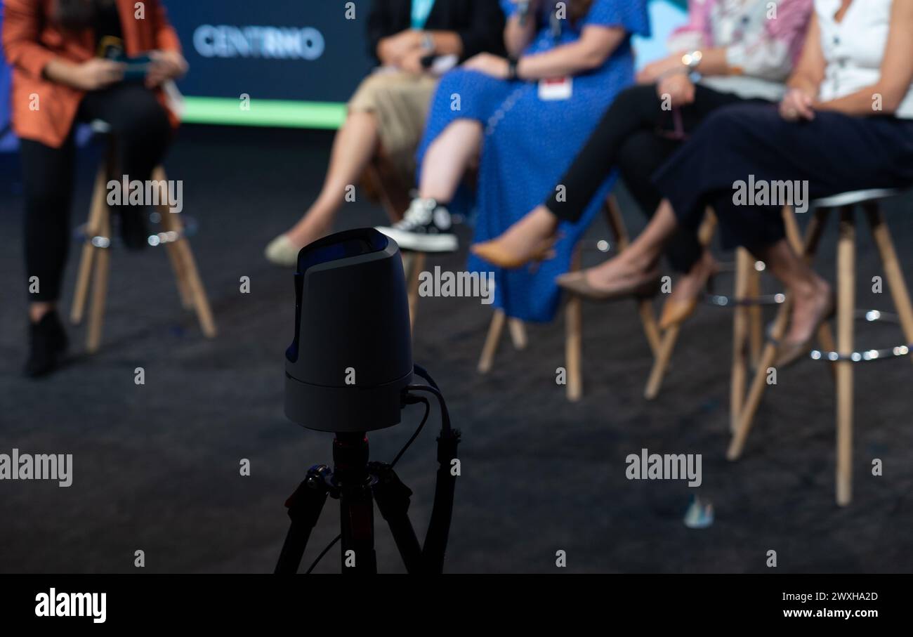 Interview with women entrepreneurs at a conference event Stock Photo ...