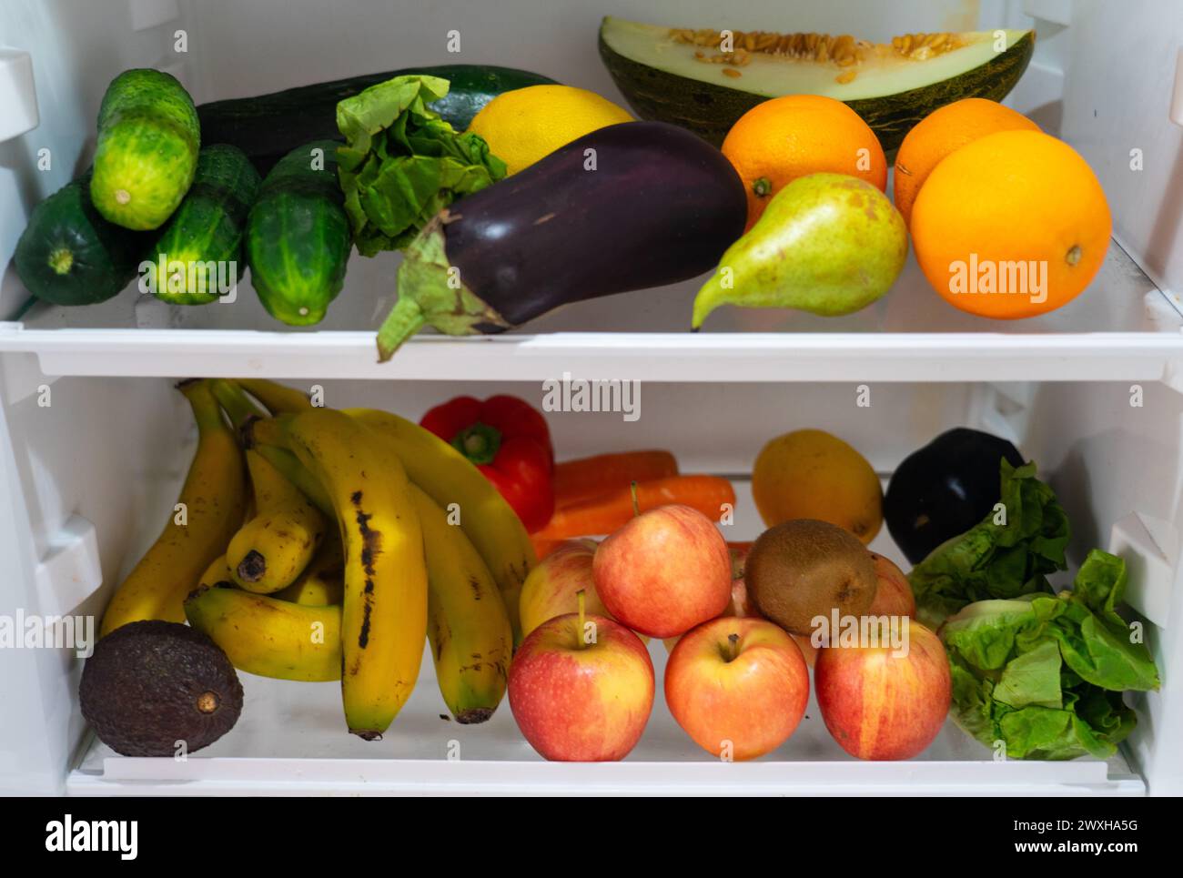 Inside a fridge full of fresh fruits and vegetables Stock Photo - Alamy